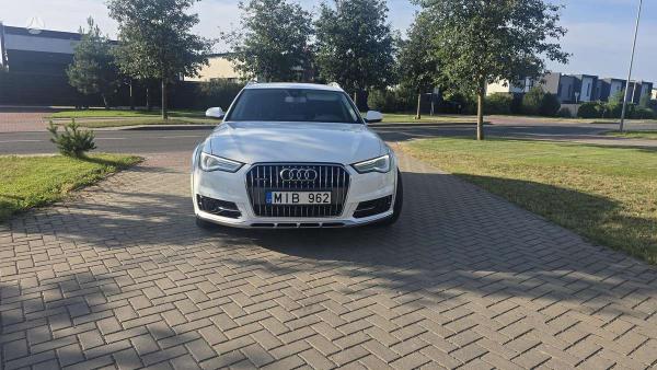 White Audi A6 Allroad 2015 in Vilnius, with an engine capacity of 2.97 L and mileage of 335 thousand km for 13700 €, photo 2 on AUTOMOTO.COM.LV