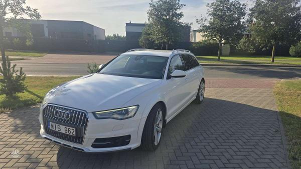 White Audi A6 Allroad 2015 in Vilnius, with an engine capacity of 2.97 L and mileage of 335 thousand km for 13700 €, photo 4 on AUTOMOTO.COM.LV