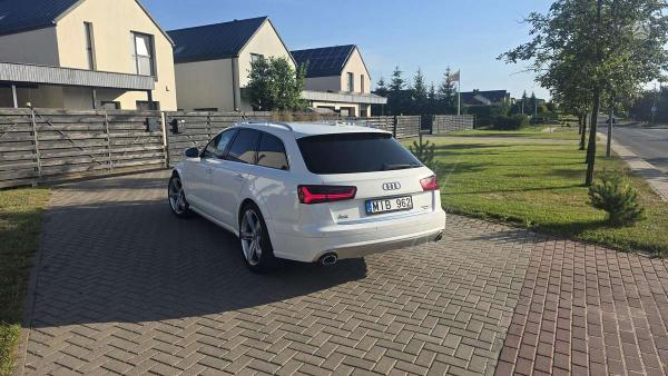 White Audi A6 Allroad 2015 in Vilnius, with an engine capacity of 2.97 L and mileage of 335 thousand km for 13700 €, photo 6 on AUTOMOTO.COM.LV