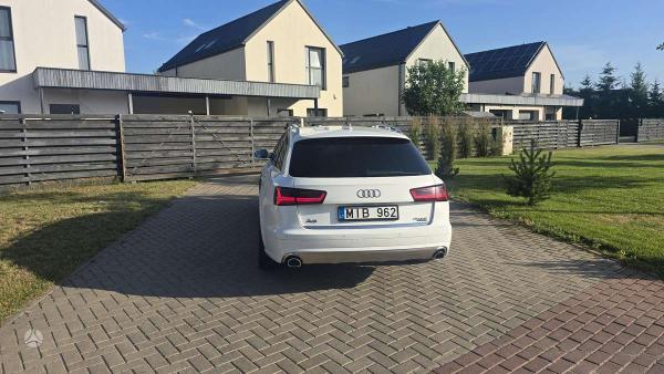White Audi A6 Allroad 2015 in Vilnius, with an engine capacity of 2.97 L and mileage of 335 thousand km for 13700 €, photo 7 on AUTOMOTO.COM.LV