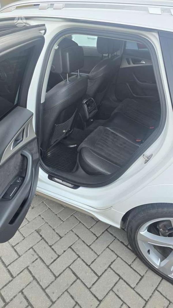 White Audi A6 Allroad 2015 in Vilnius, with an engine capacity of 2.97 L and mileage of 335 thousand km for 13700 €, photo 8 on AUTOMOTO.COM.LV