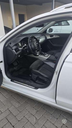 White Audi A6 Allroad 2015 in Vilnius, with an engine capacity of 2.97 L and mileage of 335 thousand km for 13700 €, photo 10 on AUTOMOTO.COM.LV