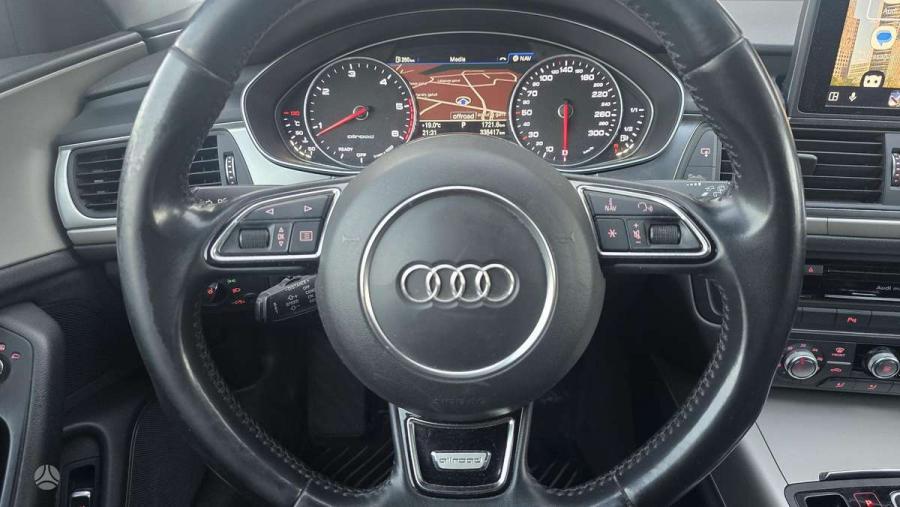 White Audi A6 Allroad 2015 in Vilnius, with an engine capacity of 2.97 L and mileage of 335 thousand km for 13700 €, photo 13 on AUTOMOTO.COM.LV