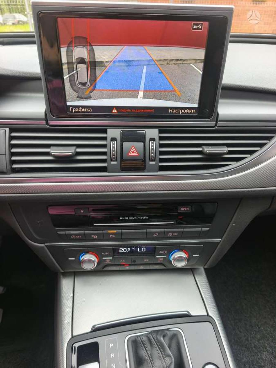 White Audi A6 Allroad 2015 in Kaunas, with an engine capacity of 2.97 L and mileage of 298 thousand km for 13950 €, photo 4 on AUTOMOTO.COM.LV