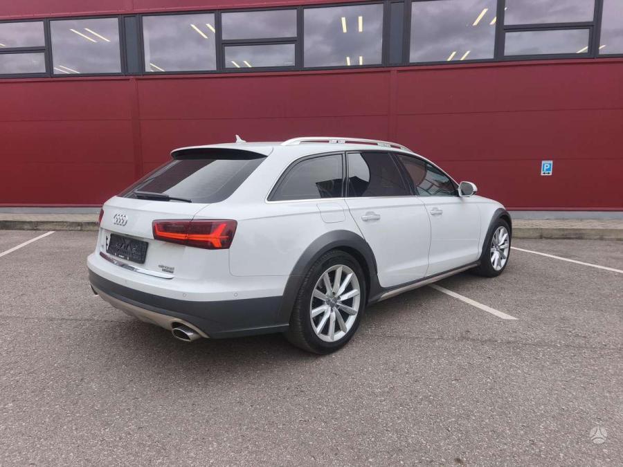 White Audi A6 Allroad 2015 in Kaunas, with an engine capacity of 2.97 L and mileage of 298 thousand km for 13950 €, photo 5 on AUTOMOTO.COM.LV