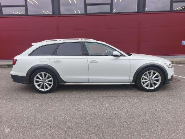 White Audi A6 Allroad 2015 in Kaunas, with an engine capacity of 2.97 L and mileage of 298 thousand km for 13950 €, photo 7 on AUTOMOTO.COM.LV