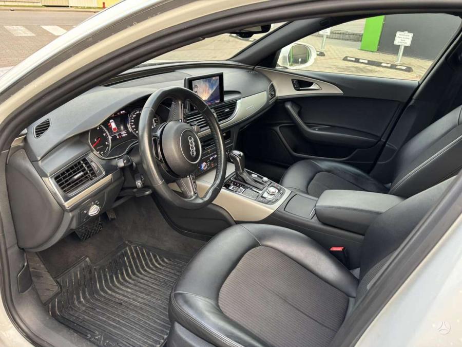 White Audi A6 Allroad 2017 in Raseiniai, with an engine capacity of 2.97 L and mileage of 170 thousand km for 16450 €, photo 18 on AUTOMOTO.COM.LV