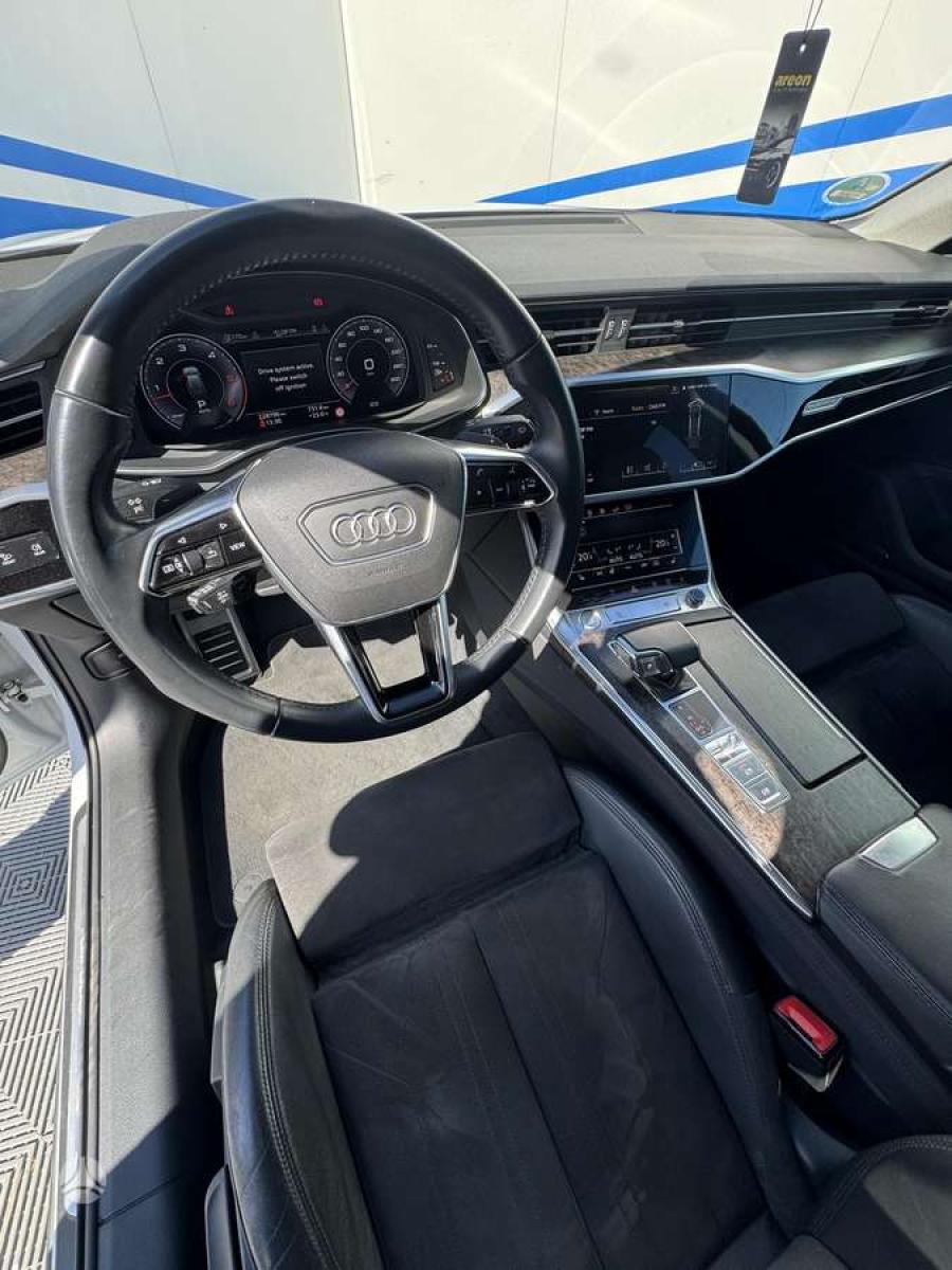 White Audi A6 Allroad 2019 in Kaunas, with an engine capacity of 2.97 L and mileage of 229 thousand km for 28499 €, photo 12 on AUTOMOTO.COM.LV