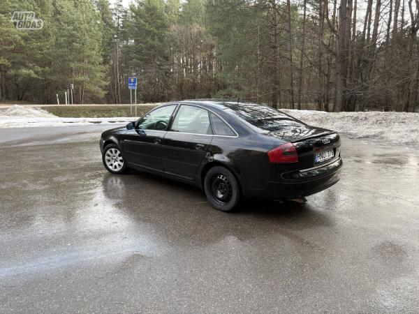 Melns Audi A6 1997 Anykščiai, ar dzinēja tilpumu 2.50 L un nobraukumu 555 tūkst. km par 600 €, foto 3 vietnē AUTOMOTO.COM.LV