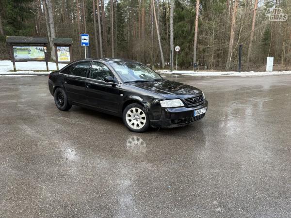 Melns Audi A6 1997 Anykščiai, ar dzinēja tilpumu 2.50 L un nobraukumu 555 tūkst. km par 600 €, foto 6 vietnē AUTOMOTO.COM.LV