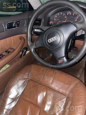 Black Audi A6 1998 in Riga, with an engine capacity of 2.40 L and mileage of 329 thousand km for 1000 €, photo 6 on AUTOMOTO.COM.LV