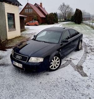 Melns Audi A6 1999 Ogre, ar dzinēja tilpumu 4.20 L un nobraukumu 374 tūkst. km par 3000 €, foto  vietnē AUTOMOTO.COM.LV