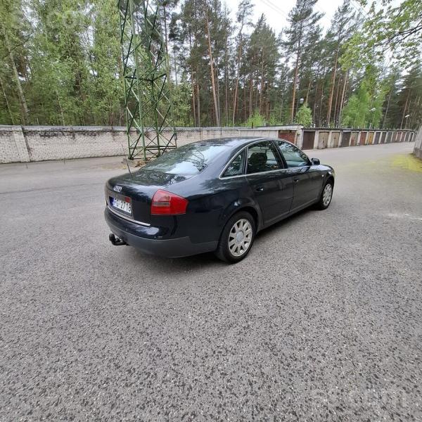 Black Audi A6 2000 in Riga, with an engine capacity of 2.40 L and mileage of 446 thousand km for 1000 €, photo 1 on AUTOMOTO.COM.LV