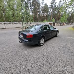 Melns Audi A6 2000 Rīga, ar dzinēja tilpumu 2.40 L un nobraukumu 446 tūkst. km par 1000 €, foto  vietnē AUTOMOTO.COM.LV
