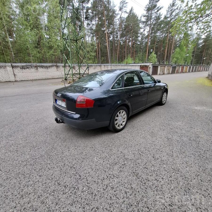 Black Audi A6 2000 in Riga, with an engine capacity of 2.40 L and mileage of 446 thousand km for 1000 €, photo 1 on AUTOMOTO.COM.LV