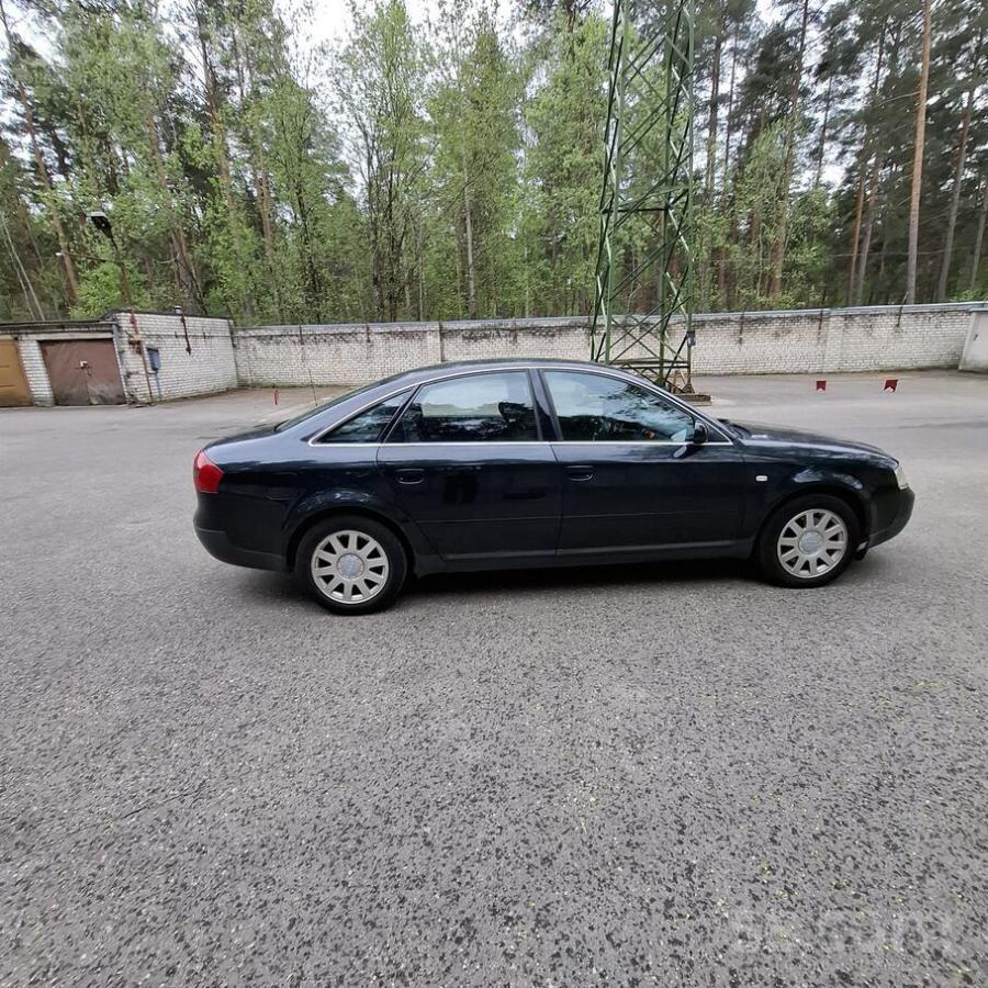 Black Audi A6 2000 in Riga, with an engine capacity of 2.40 L and mileage of 446 thousand km for 1000 €, photo 3 on AUTOMOTO.COM.LV
