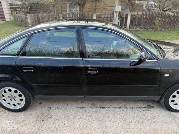 Black Audi A6 2003 in Kaunas, with an engine capacity of 2.50 L and mileage of 309 thousand km for 1100 €, photo 5 on AUTOMOTO.COM.LV