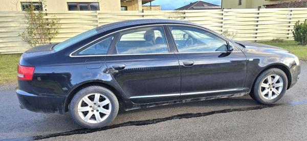 Black Audi A6 2004 in Panevezys, with an engine capacity of 2.39 L and mileage of 290 thousand km for 2000 €, photo 2 on AUTOMOTO.COM.LV
