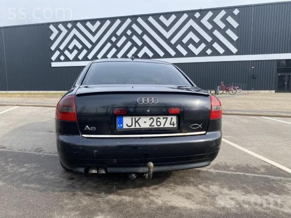 Black Audi A6 2004 in Riga, with an engine capacity of 1.90 L and mileage of 402 thousand km for 1100 €, photo 3 on AUTOMOTO.COM.LV