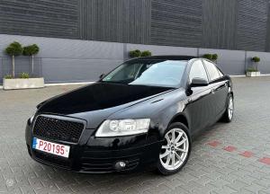 Black Audi A6 2005 in Siauliai, with an engine capacity of 2.39 L and mileage of 266 thousand km for 2690 €, photo  on AUTOMOTO.COM.LV