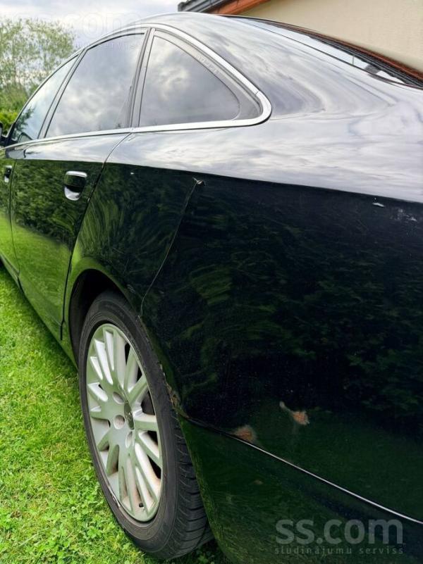 Black Audi A6 2007 in Riga, with an engine capacity of 3.00 L and mileage of 415 thousand km for 1800 €, photo 8 on AUTOMOTO.COM.LV