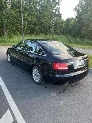 Melns Audi A6 2007 Kauņa, ar dzinēja tilpumu 2.39 L un nobraukumu 293 tūkst. km par 2100 €, foto  vietnē AUTOMOTO.COM.LV