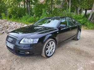 Black Audi A6 2009 in Riga, with an engine capacity of 2.70 L and mileage of 258 thousand km for 4999 €, photo  on AUTOMOTO.COM.LV