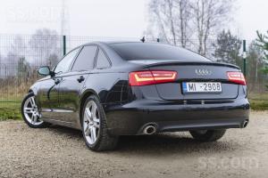 Black Audi A6 2011 in Riga, with an engine capacity of 3.00 L and mileage of 278 thousand km for 12790 €, photo 4 on AUTOMOTO.COM.LV