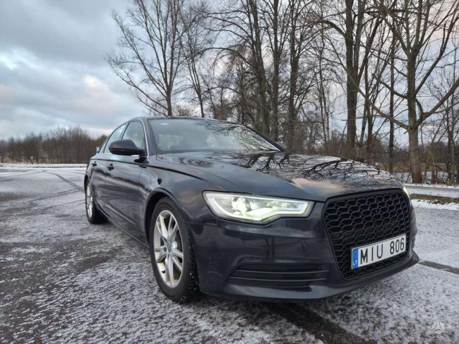 Black Audi A6 2011 in Vilnius, with an engine capacity of 2.97 L and mileage of 318 thousand km for 9800 €, photo 1 on AUTOMOTO.COM.LV