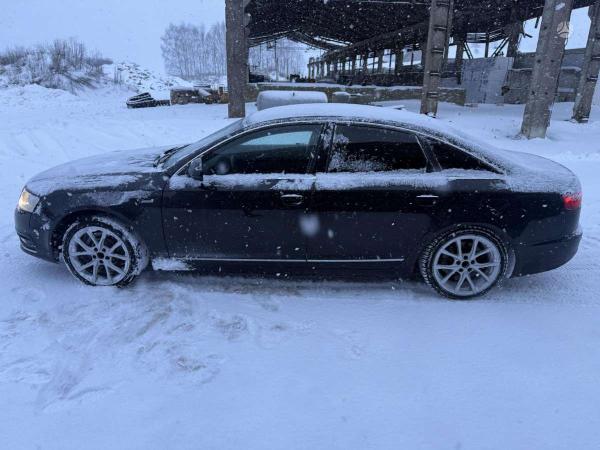 Black Audi A6 2011 in Kaunas, with an engine capacity of 3.00 L and mileage of 177 thousand km for 1499 €, photo 4 on AUTOMOTO.COM.LV