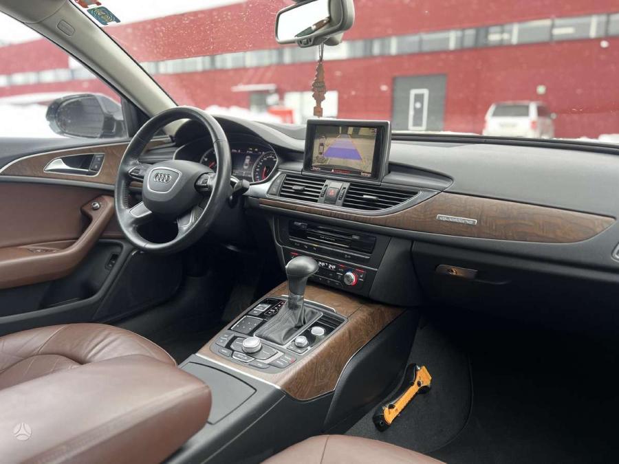 Black Audi A6 2011 in Kaunas, with an engine capacity of 2.97 L and mileage of 276 thousand km for 9999 €, photo 13 on AUTOMOTO.COM.LV