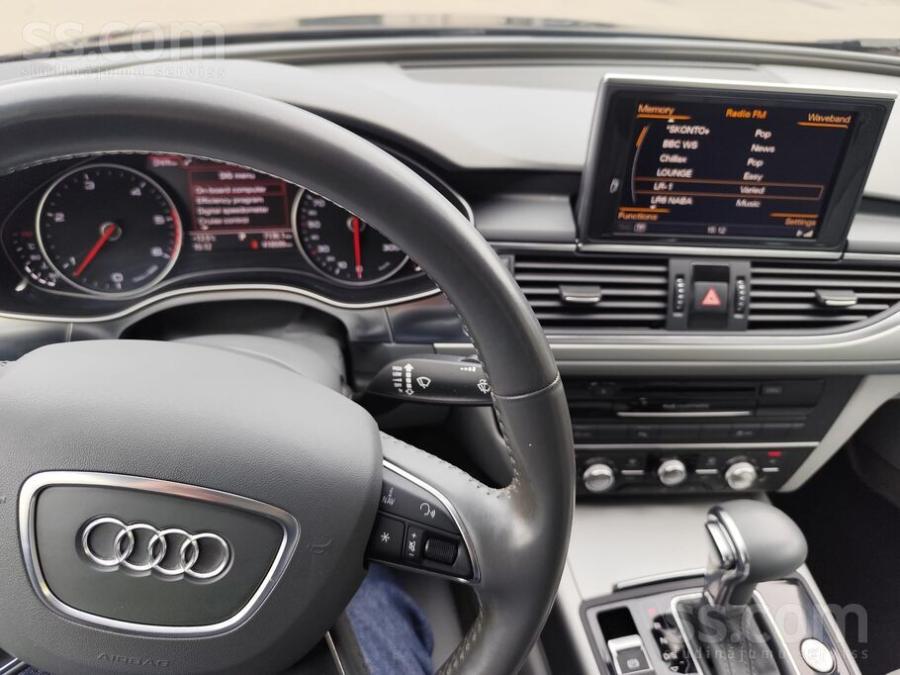 Black Audi A6 2011 in Riga, with an engine capacity of 3.00 L and mileage of 418 thousand km for 7650 €, photo 8 on AUTOMOTO.COM.LV