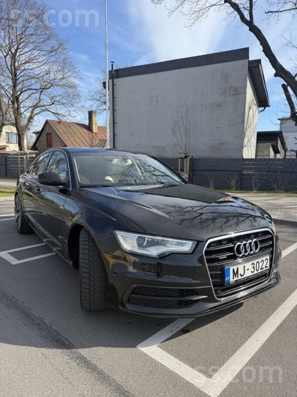 Black Audi A6 2011 in Riga, with an engine capacity of 3.00 L and mileage of 311 thousand km for 7950 €, photo 3 on AUTOMOTO.COM.LV