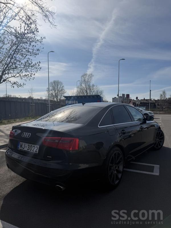 Black Audi A6 2011 in Riga, with an engine capacity of 3.00 L and mileage of 311 thousand km for 7950 €, photo 5 on AUTOMOTO.COM.LV