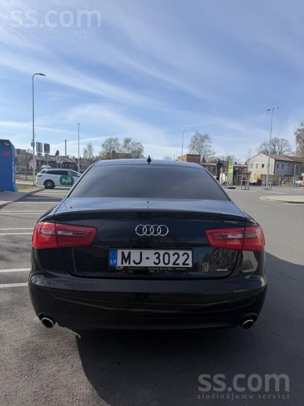 Black Audi A6 2011 in Riga, with an engine capacity of 3.00 L and mileage of 311 thousand km for 7950 €, photo 6 on AUTOMOTO.COM.LV
