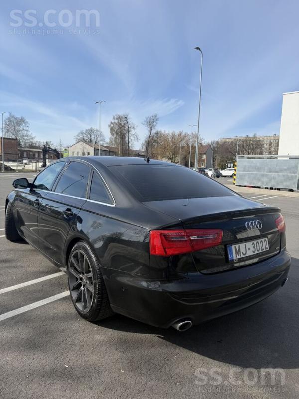 Black Audi A6 2011 in Riga, with an engine capacity of 3.00 L and mileage of 311 thousand km for 7950 €, photo 8 on AUTOMOTO.COM.LV
