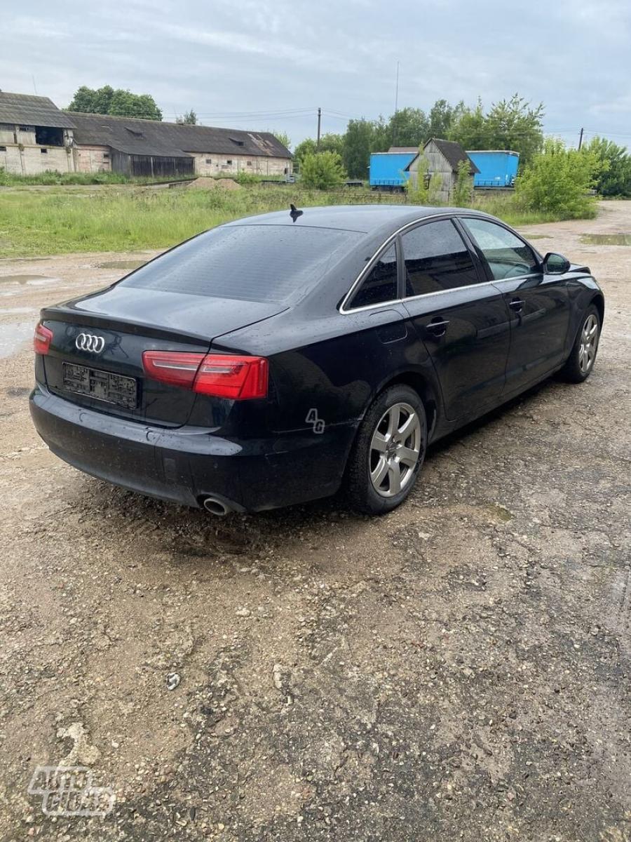 Black Audi A6 2011 in Panevezys, with an engine capacity of 3.00 L and mileage of 340 thousand km for 4590 €, photo 4 on AUTOMOTO.COM.LV