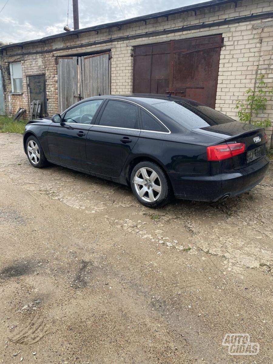Black Audi A6 2011 in Panevezys, with an engine capacity of 3.00 L and mileage of 340 thousand km for 4590 €, photo 5 on AUTOMOTO.COM.LV
