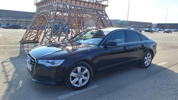 Black Audi A6 2011 in Mazeikiai, with an engine capacity of 3.00 L and mileage of 387 thousand km for 9900 €, photo 1 on AUTOMOTO.COM.LV