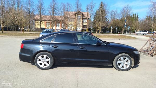 Black Audi A6 2011 in Mazeikiai, with an engine capacity of 3.00 L and mileage of 387 thousand km for 9900 €, photo 8 on AUTOMOTO.COM.LV
