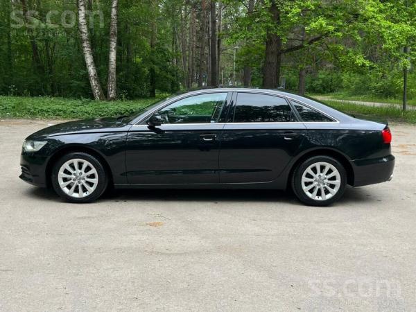 Black Audi A6 2011 in Riga, with an engine capacity of 2.80 L and mileage of 0 thousand km for 7299 €, photo 2 on AUTOMOTO.COM.LV