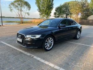 Melns Audi A6 2011 Ludza, ar dzinēja tilpumu 3.00 L un nobraukumu 279 tūkst. km par 9950 €, foto  vietnē AUTOMOTO.COM.LV