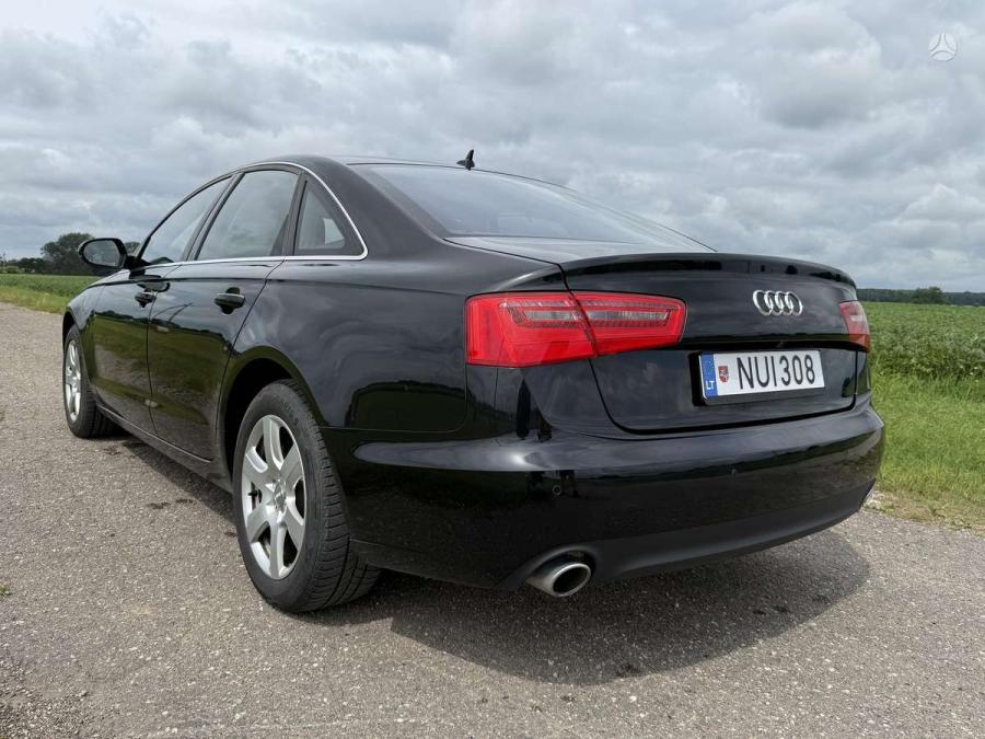 Black Audi A6 2011 in Marijampole, with an engine capacity of 2.97 L and mileage of 350 thousand km for 9400 €, photo 5 on AUTOMOTO.COM.LV