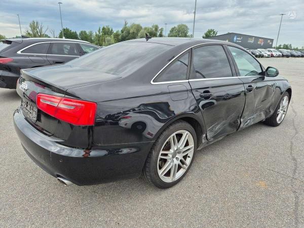 Black Audi A6 2011 in Vilnius, with an engine capacity of 2.97 L and mileage of 269 thousand km for 7300 €, photo 4 on AUTOMOTO.COM.LV