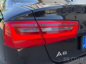 Black Audi A6 2011 in Jelgava, with an engine capacity of 3.00 L and mileage of 308 thousand km for 8500 €, photo 19 on AUTOMOTO.COM.LV