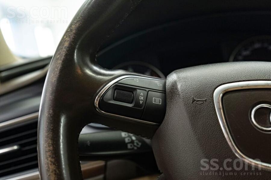 Black Audi A6 2011 in Riga, with an engine capacity of 2.80 L and mileage of 258 thousand km for 7250 €, photo 16 on AUTOMOTO.COM.LV