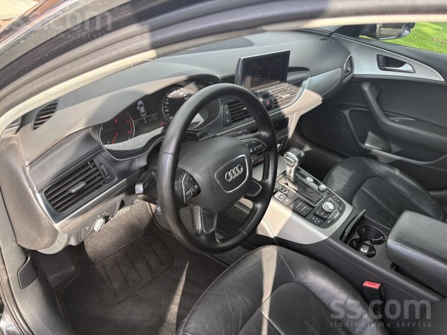 Black Audi A6 2011 in Bauska, with an engine capacity of 3.00 L and mileage of 262 thousand km for 8900 €, photo 11 on AUTOMOTO.COM.LV