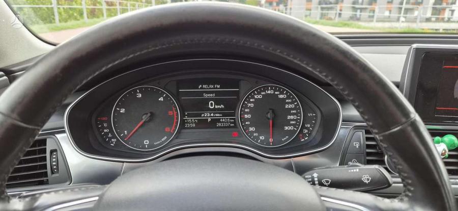 Black Audi A6 2011 in Vilnius, with an engine capacity of 2.97 L and mileage of 283 thousand km for 6800 €, photo 14 on AUTOMOTO.COM.LV