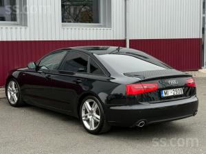 Black Audi A6 2011 in Riga, with an engine capacity of 3.00 L and mileage of 266 thousand km for 8990 €, photo 4 on AUTOMOTO.COM.LV