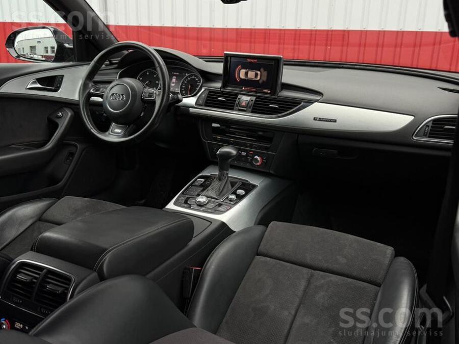 Black Audi A6 2011 in Riga, with an engine capacity of 3.00 L and mileage of 266 thousand km for 8990 €, photo 12 on AUTOMOTO.COM.LV